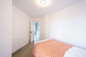 Apartamento Superior, 4 quartos, varanda, Vista para a cidade | Ferro/tábua de engomar, Wi-fi grátis