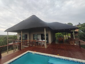 Apartamento clássico, vista para a lagoa | Área de estar