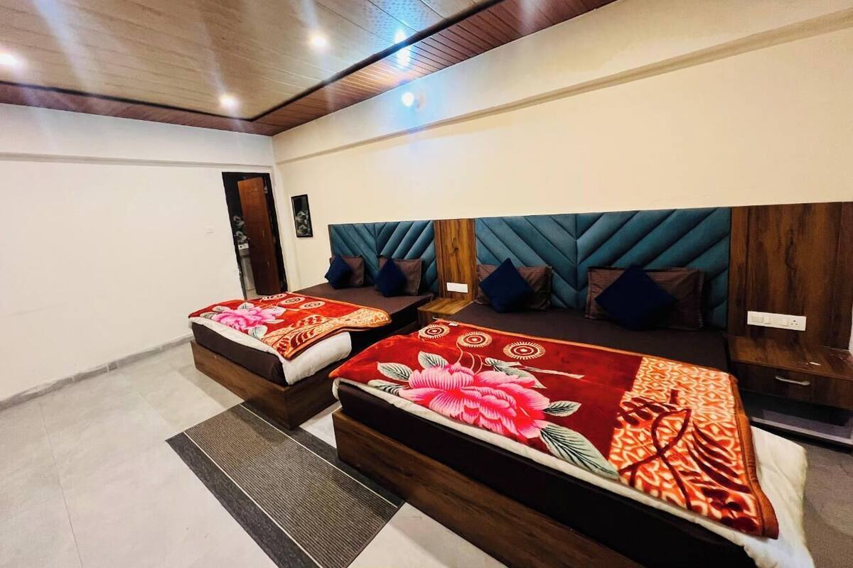 Quarto quádruplo | Wi-Fi de cortesia, roupa de cama