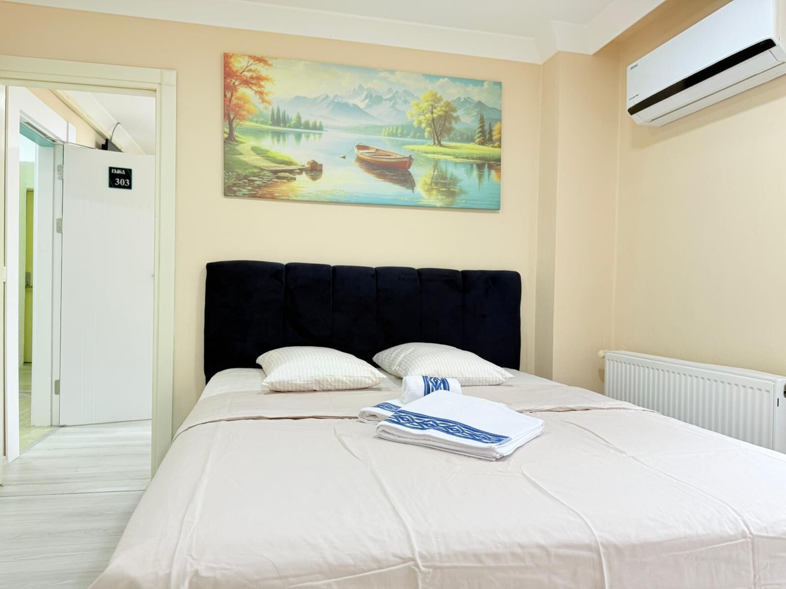 Quarto Quádruplo Familiar, varanda, vista para o jardim | Quartos insonorizados, ferro/tábua de engomar, Wi-fi grátis 