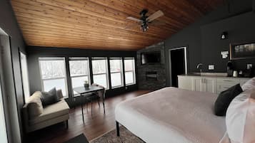 Suíte, 1 cama King, cozinha americana, vista para o jardim | Wi-Fi de cortesia