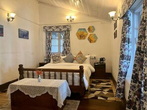 Quarto casal básico, vista para o jardim | Wi-Fi de cortesia