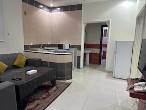 Apartamento Familiar, 2 quartos | Sala de estar | Televisor LED de 42 polegadas com canais via satélite