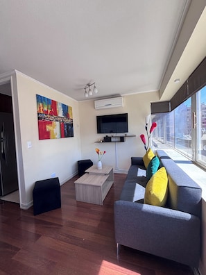 Apartamento luxo, vista para a cidade | Área de estar