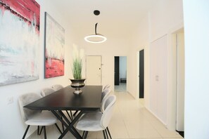 Apartamento | Área de estar | TV de tela plana
