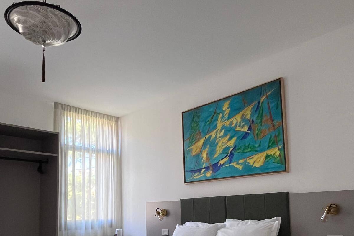 Quarto Triplo Superior, Vista para a cidade | Cofre no quarto, Wi-fi grátis