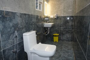 Quarto Deluxe | Casa de banho