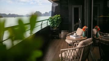 Suíte luxo, vista para o oceano | Terraço/pátio