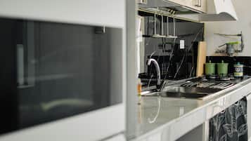 Apartamento, vista para a cidade | Cozinha privada
