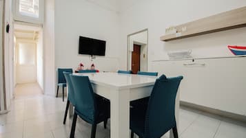 Apartamento, vista para a cidade | Área de estar