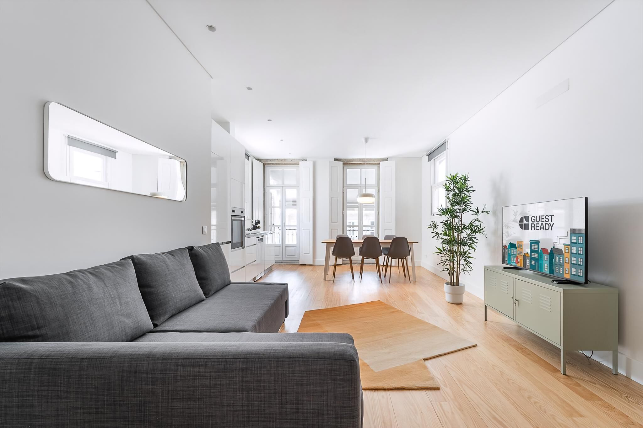 Apartamento (Two-Bedroom Apartment) | Área de estar | TV de tela plana 32 polegadas com canais digitais