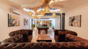 Apartamento, 1 quarto, vista para o jardim | Sala de jogos