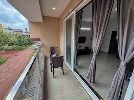 Apartamento Deluxe, varanda, vista para o mar | Varanda
