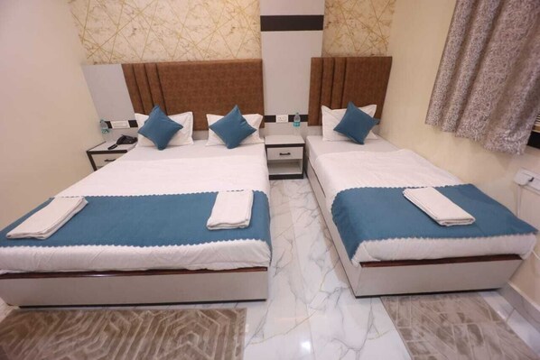 Quarto triplo | Wi-Fi de cortesia