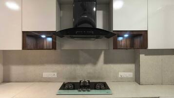 Apartamento superluxo, vista para a colina | Cozinha privada