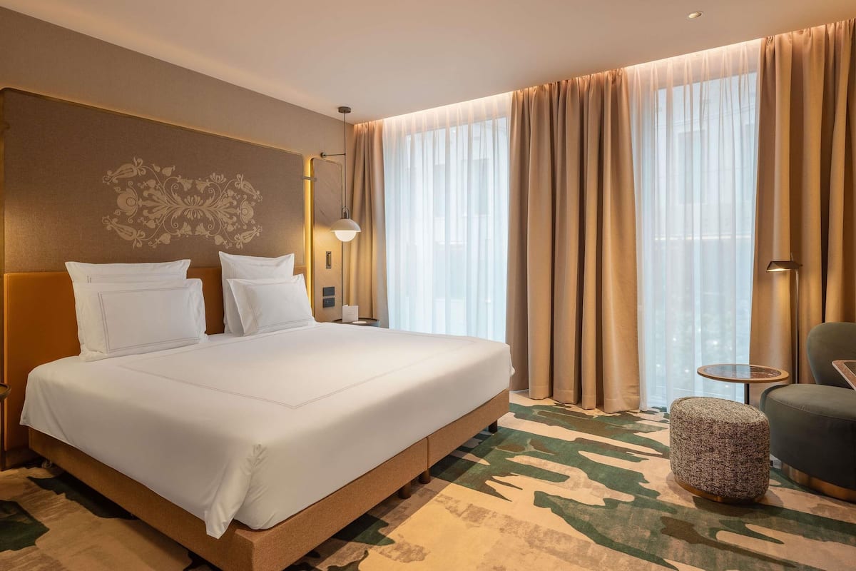 Quarto superior | Roupas de cama premium, frigobar, cofres nos quartos, escrivaninha