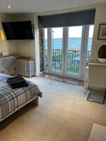 Quarto Duplo Deluxe, varanda, vista para o oceano | Quartos insonorizados, ferro/tábua de engomar, Wi-fi grátis 