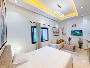 Estúdio Deluxe, vista para o jardim | Ferro/tábua de engomar, Wi-fi grátis 