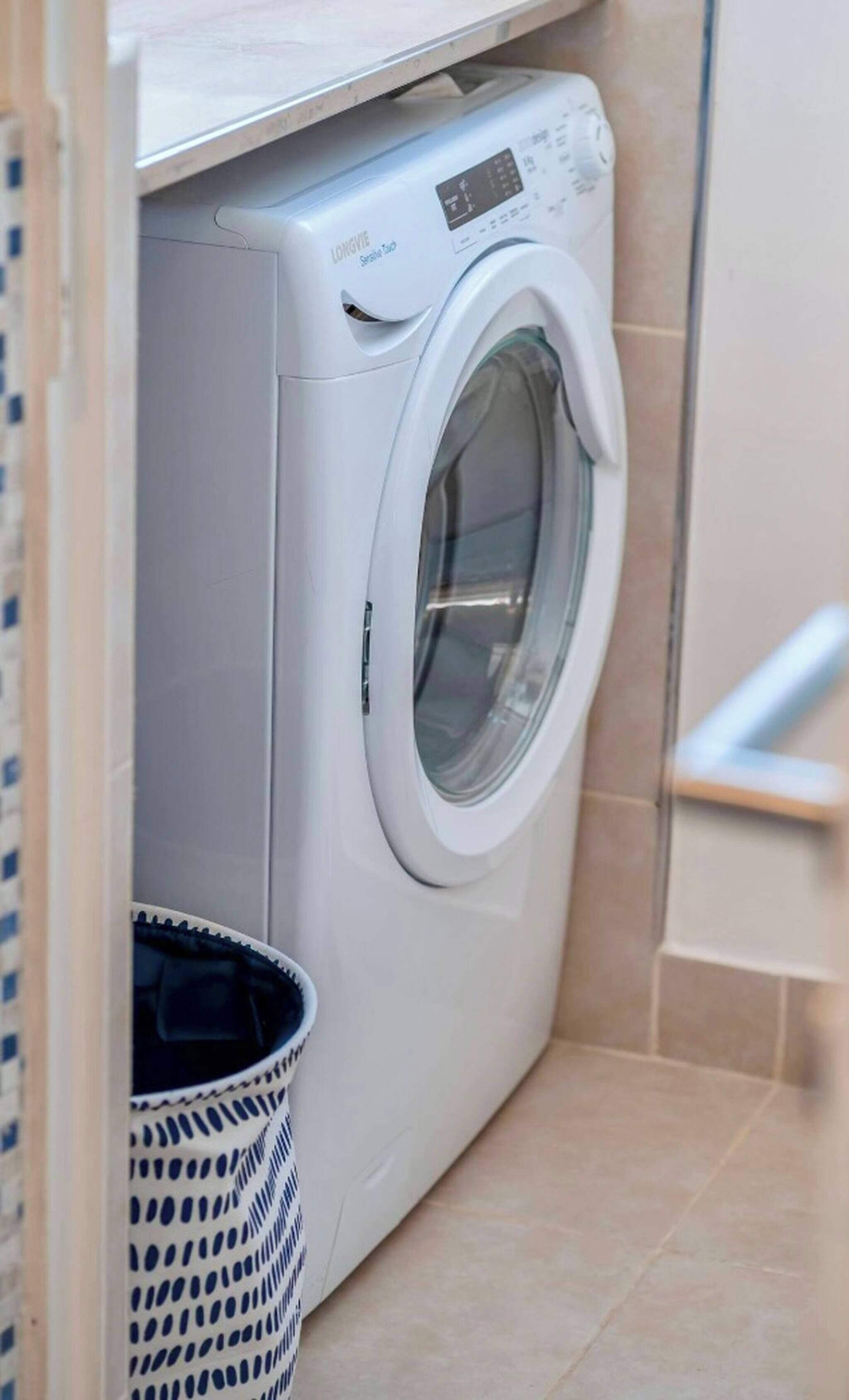 Apartamento, 1 quarto, sacada, vista para a cidade | Lavanderia