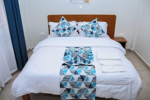 Quarto Individual Deluxe, Vista para a cidade | Wi-fi grátis, roupa de cama fornecida 