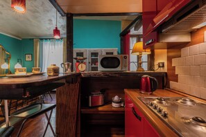 Apartamento, 1 cama de casal | Cozinha privada | Geladeira, micro-ondas, fogão, cooktop