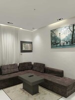 Suite Deluxe, 2 quartos | Sala de estar