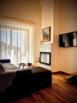 Suíte superluxo, sacada, vista para a cidade | Vista do quarto