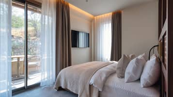 Estúdio conforto, vista para o jardim | Cofres nos quartos, ferros/tábuas de passar roupa, Wi-Fi de cortesia