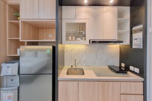 Apartamento Standard | Cozinha privada | Utensílios de cozinha 