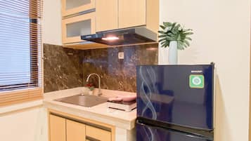 Apartamento Standard | Cozinha privada | Utensílios de cozinha