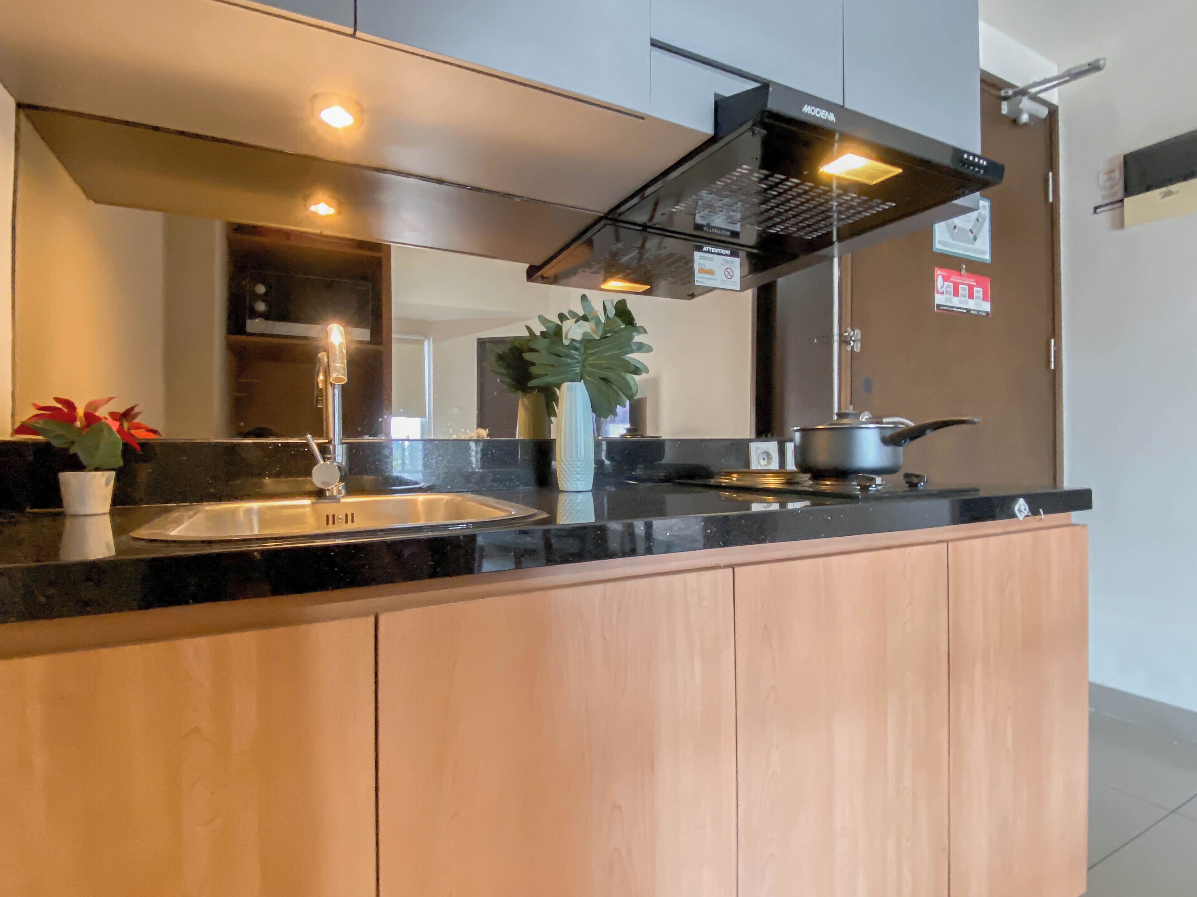 Apartamento | Cozinha privada | Geladeira, cooktop, talheres/pratos/utensílios de cozinha