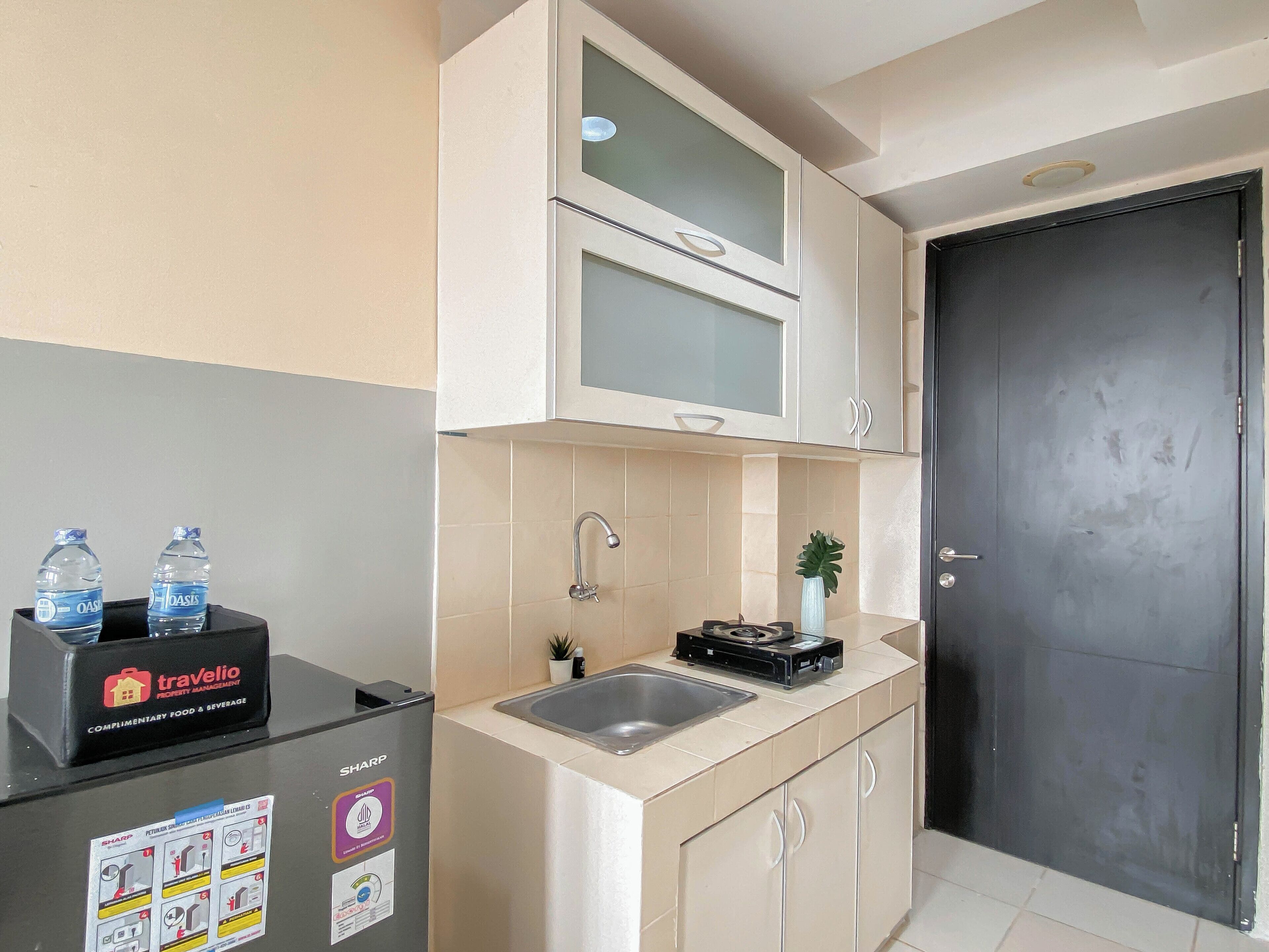 Apartamento | Cozinha privada | Um frigorífico, uma placa de cozinha, utensílios de cozinha 