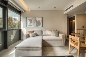 Apartamento superluxo, 1 quarto | Sala de estar | Smart TV 55 polegadas com canais digitais