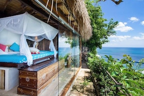 Quarto Duplo Deluxe, vista para o oceano | Wi-fi grátis, roupa de cama fornecida