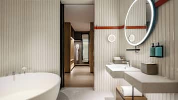 Suíte executiva, 1 cama King, acesso ao Club Lounge, vista para a cidade | Banheiro | Chuveiro, chuveiro com efeito de chuva, secador de cabelo