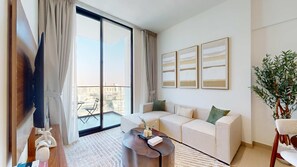 Apartamento premium, sacada, vista para a cidade | Sala de estar