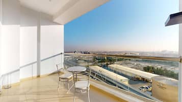 Apartamento superior, 2 quartos, vista para a cidade | Sacada