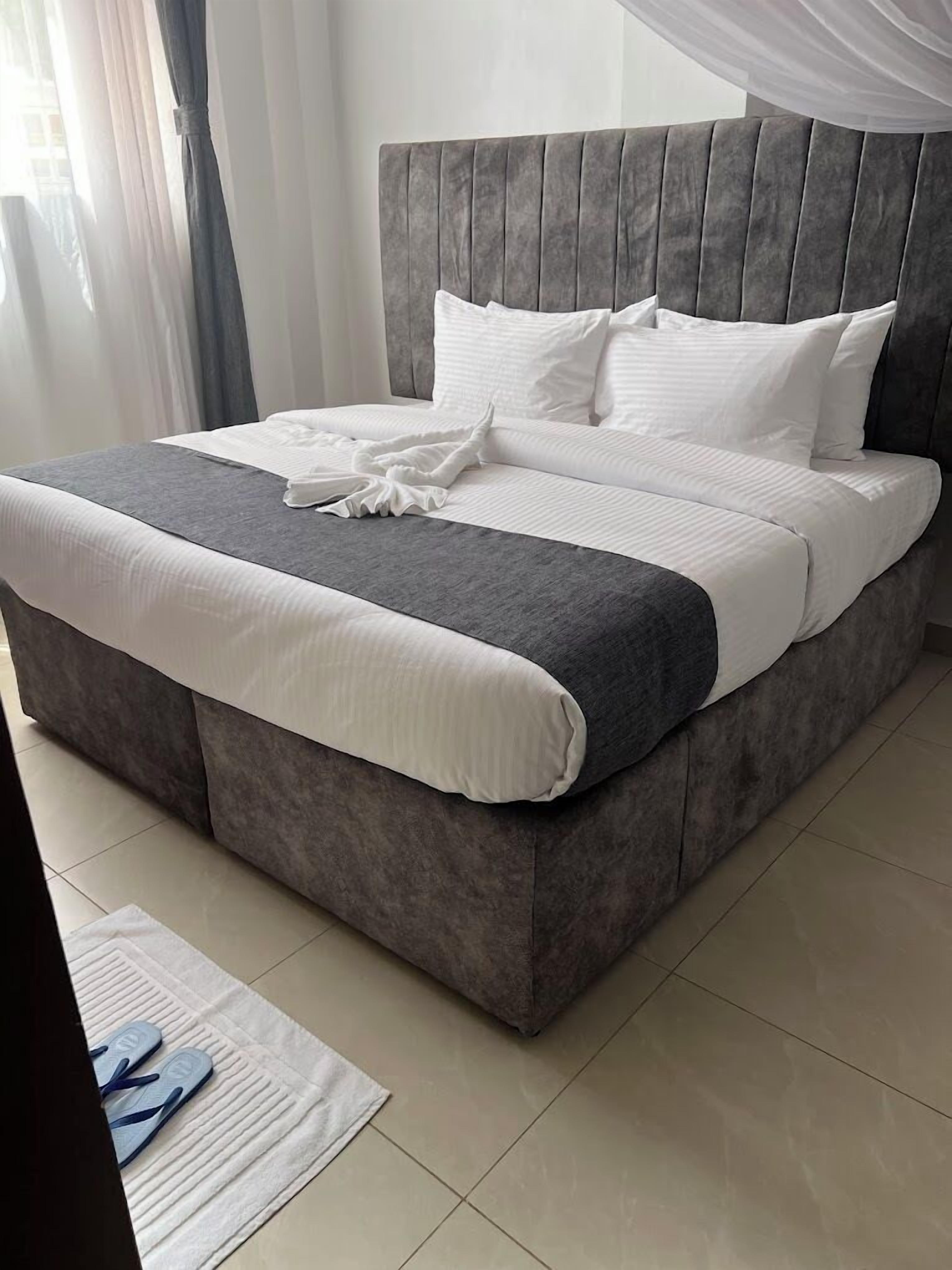 Quarto solteiro luxo, vista para a cidade | Wi-Fi de cortesia, roupa de cama