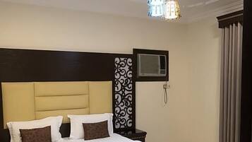 Quarto casal conforto | Área de estar