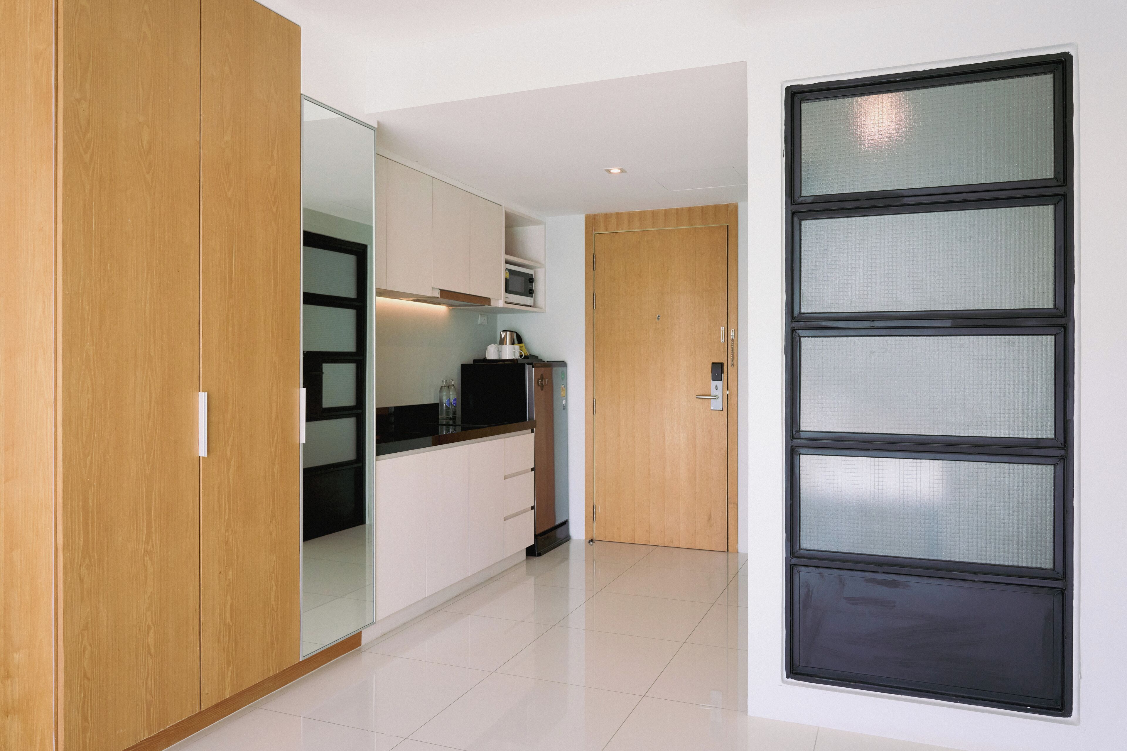 Quarto Individual Deluxe, varanda | Guarda-roupa