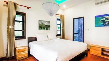 Bungalow, vista para o jardim | Cortinas/cortinados opacos, Wi-fi grátis