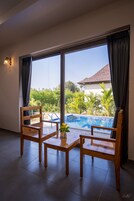 Quarto Duplo Deluxe | Sala de estar