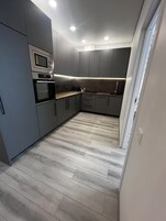 Apartamento Familiar, vista para o jardim | Cortinas/cortinados opacos, ferro/tábua de engomar