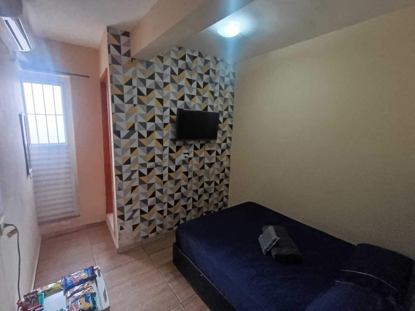 Suite Básica, Vista para a cidade | Ferro/tábua de engomar, Wi-fi grátis 