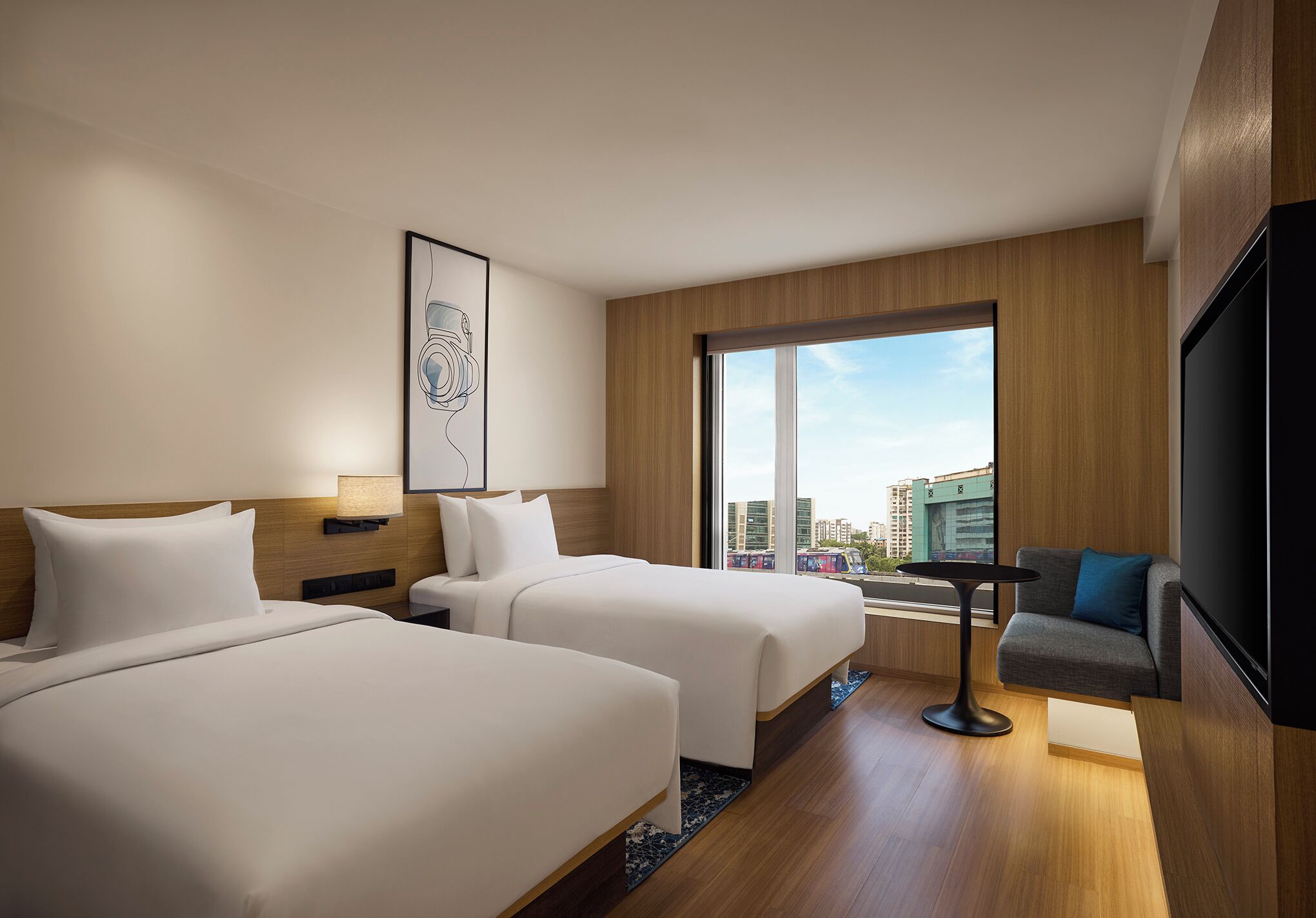 Roupas de cama premium, frigobar, cofres nos quartos