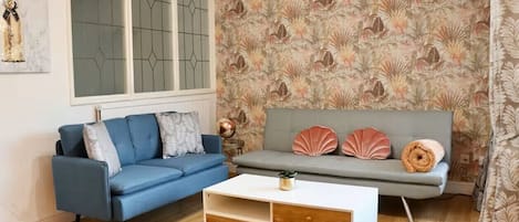 Apartamento Comfort, vista para o jardim | Sala de estar