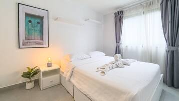 Apartamento Comfort, varanda, vista para o jardim | Cofre no quarto, secretária, ferro/tábua de engomar, Wi-fi grátis