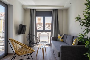 Apartamento superior, terraço | Área de estar
