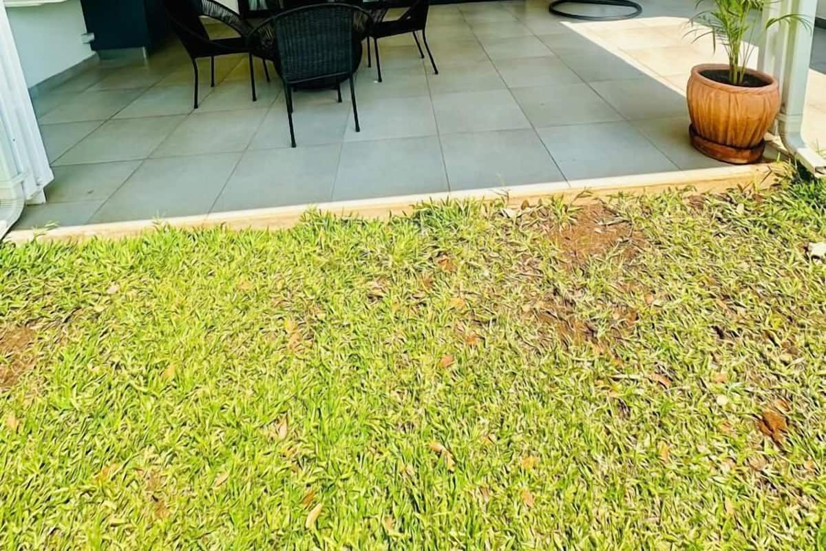 Apartamento família, vista para o jardim | Fachada