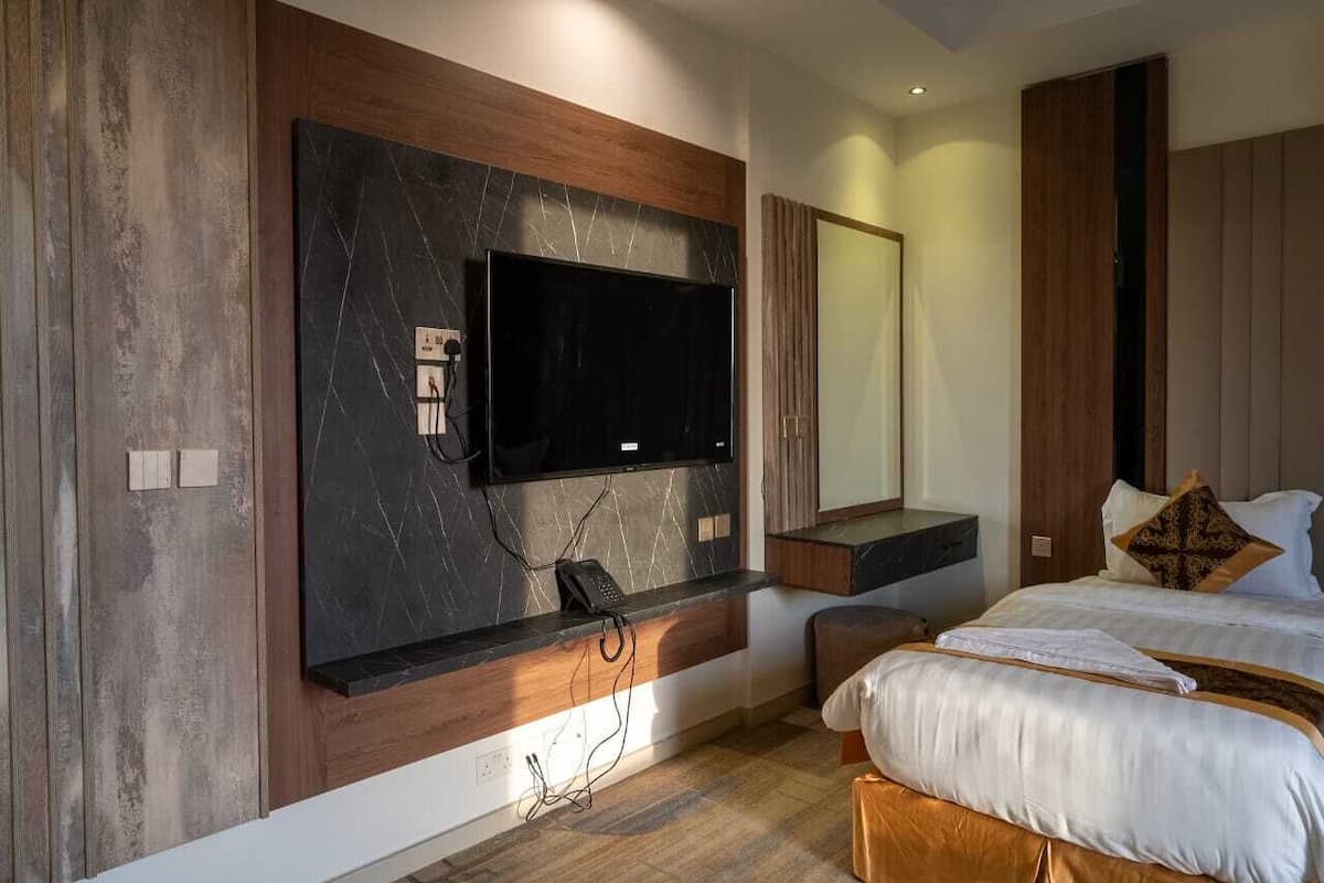 Quarto duplo, vista para a cidade | Cofres nos quartos, cortinas blackout, quartos à prova de som